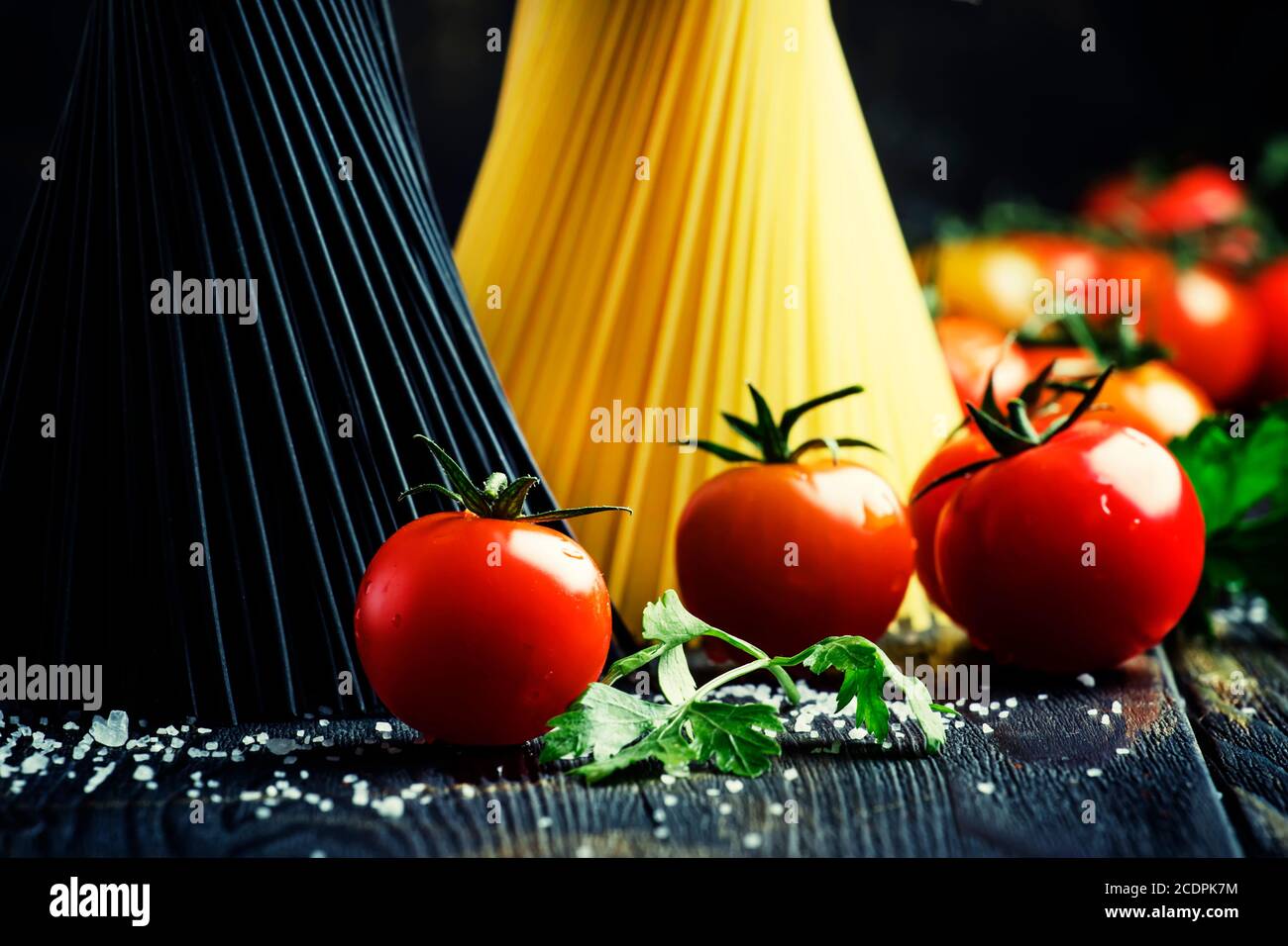 Spaghetti and tomatoes, still life in low key, selective focus Stock ...