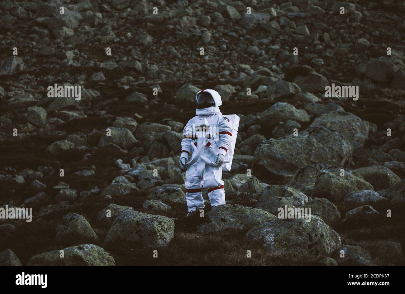 Astronaut exploring a new planet. Searching for a new home for humanity ...