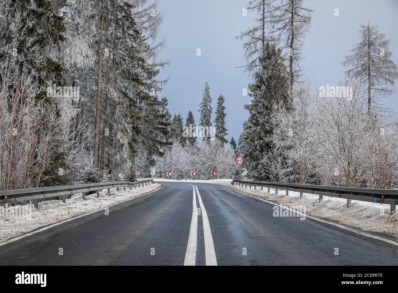 Black asphalt road in Tatras at winter in Poland, Europe Stock Photo ...