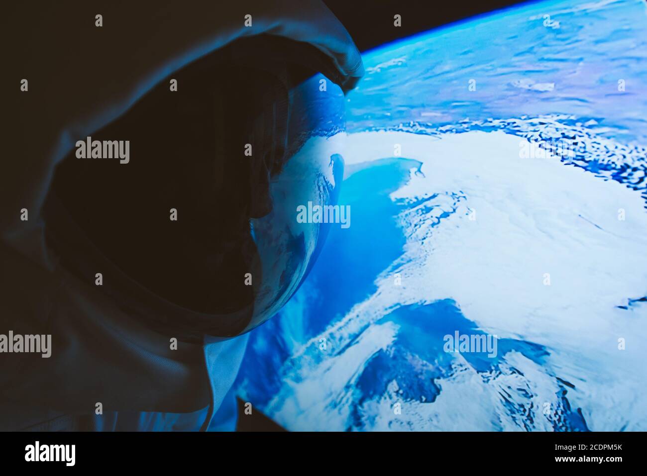 Astronaut looking planet earth from the window of his capsule. Concept ...