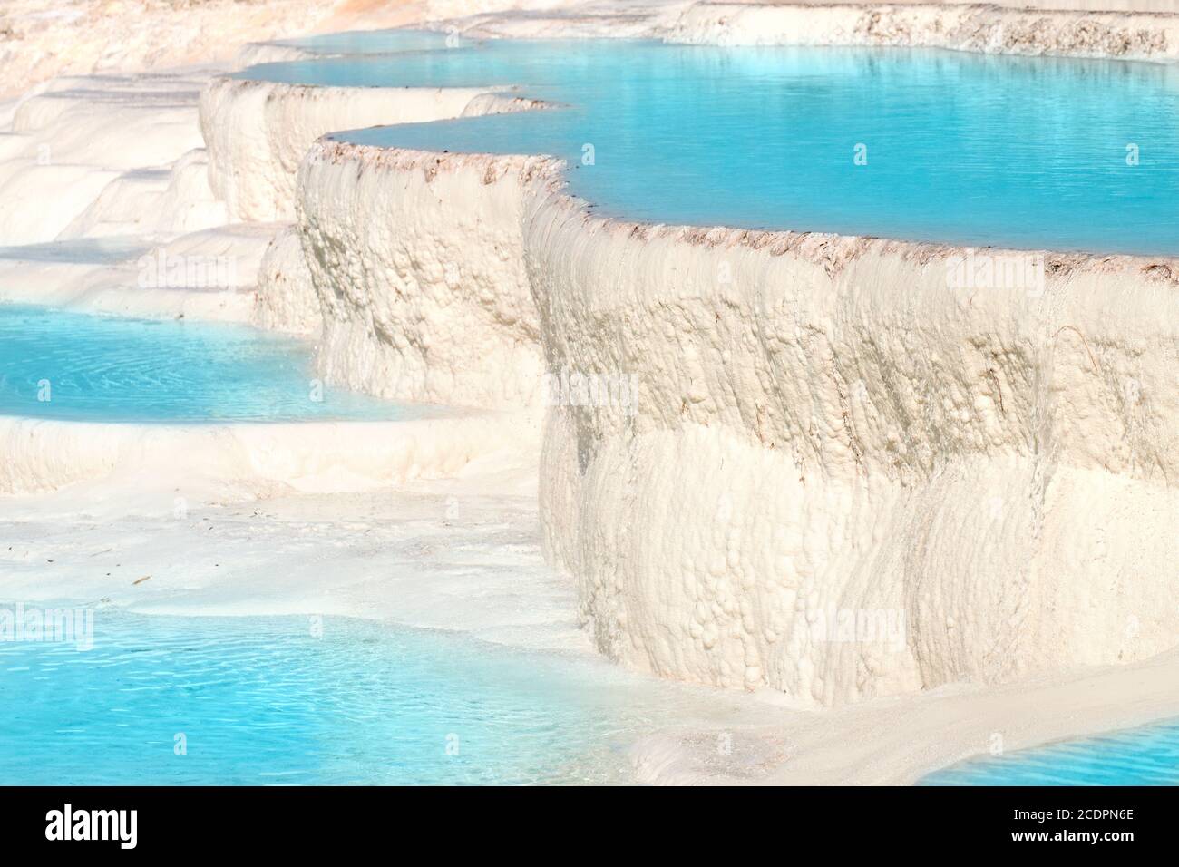 Natural travertine pools and terraces, Pamukkale, Turkey Stock Photo ...