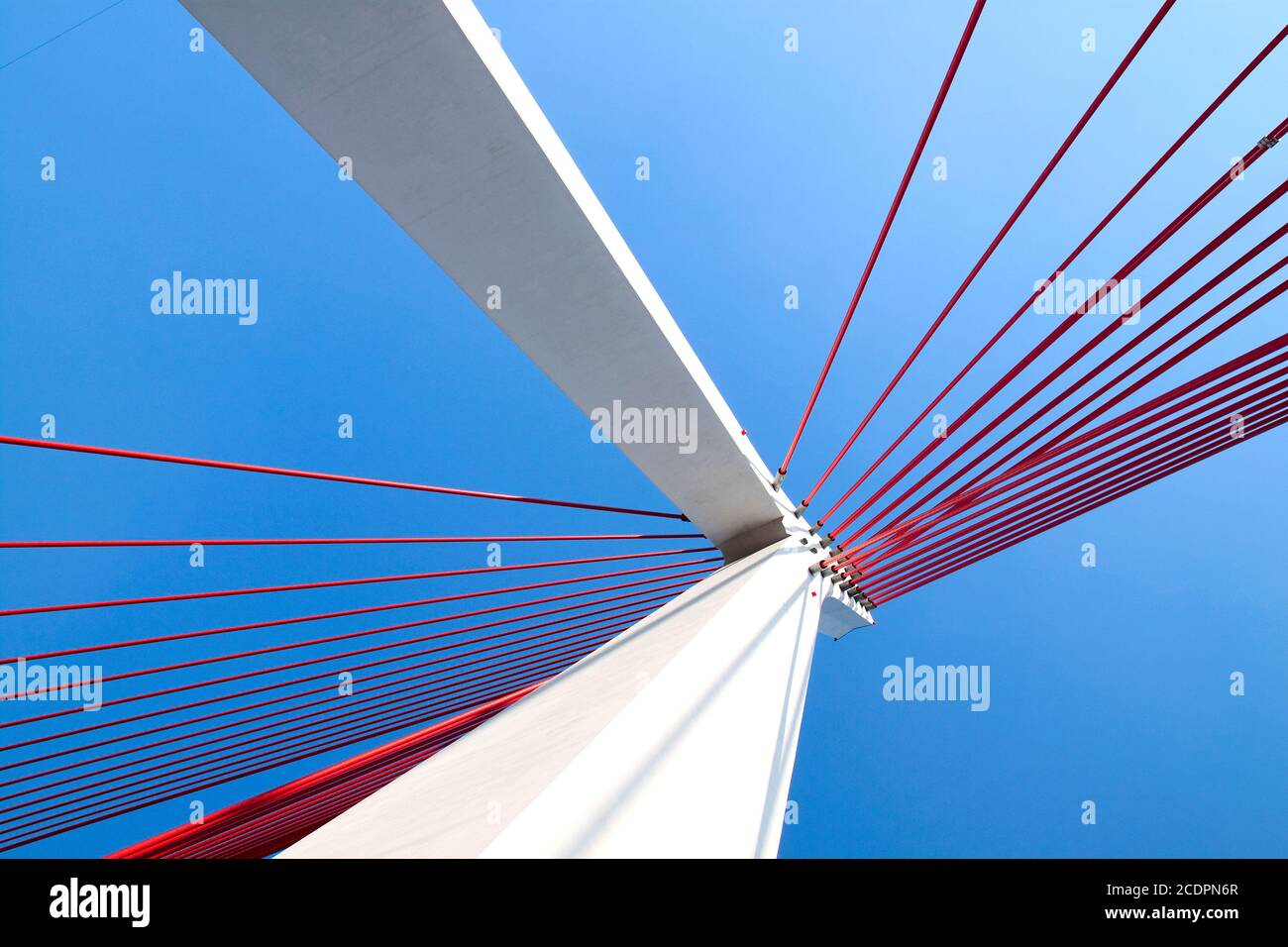 Suspension bridge with cables reaching to the deck of the bridge from ...