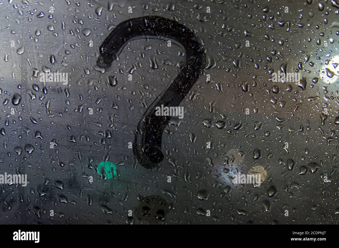 Autumn rain, the inscription on the sweaty glass - question mark Stock ...