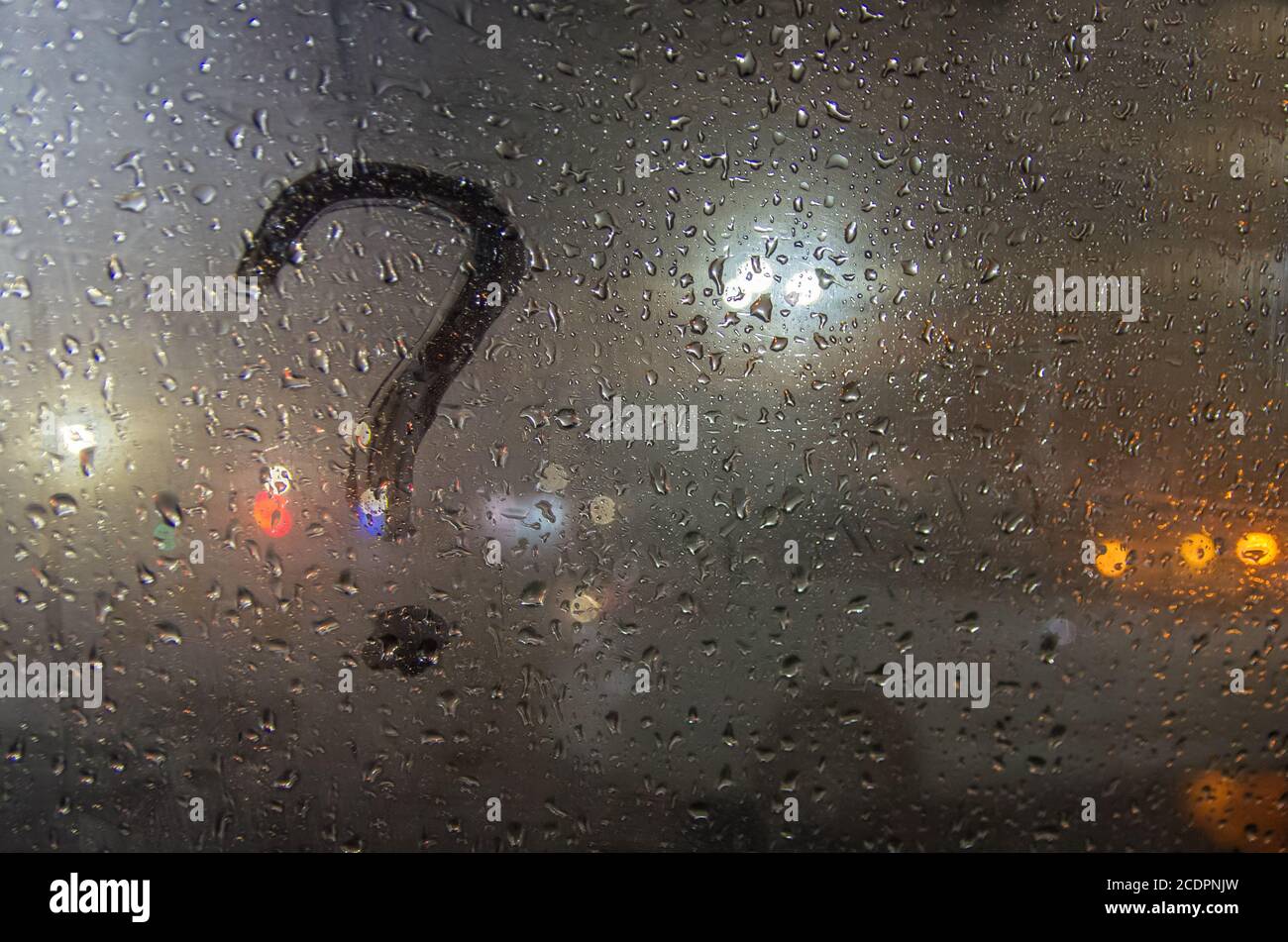 Autumn rain, the inscription on the sweaty glass - question mark Stock ...