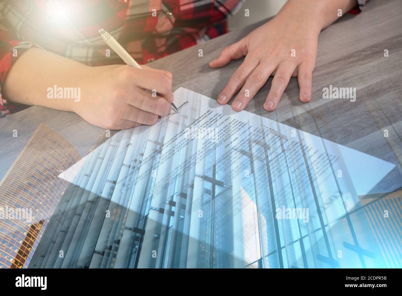 Woman hands signing a contract; multiple exposure Stock Photo - Alamy