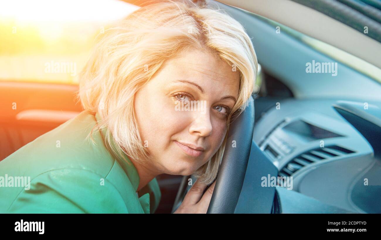 Happy lady driver driving blue hi-res stock photography and images - Alamy