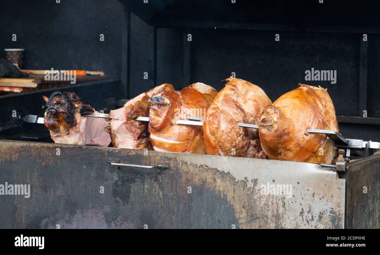 Meat roasting over a charcoal bed in Prague Stock Photo - Alamy