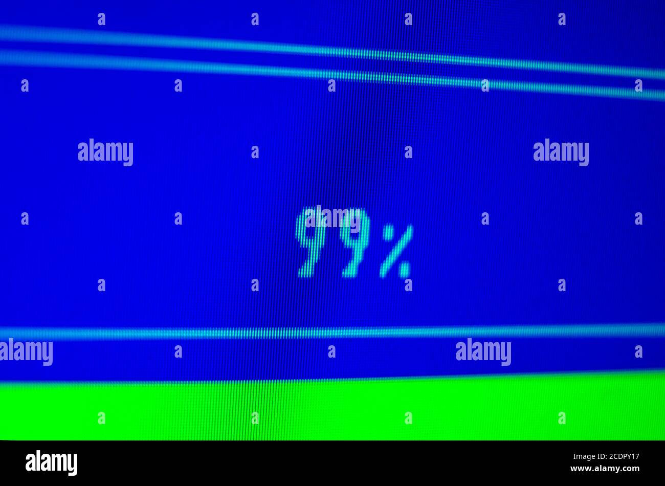 laptop with 99% loading bar on a blue screen. Setting the loading ...