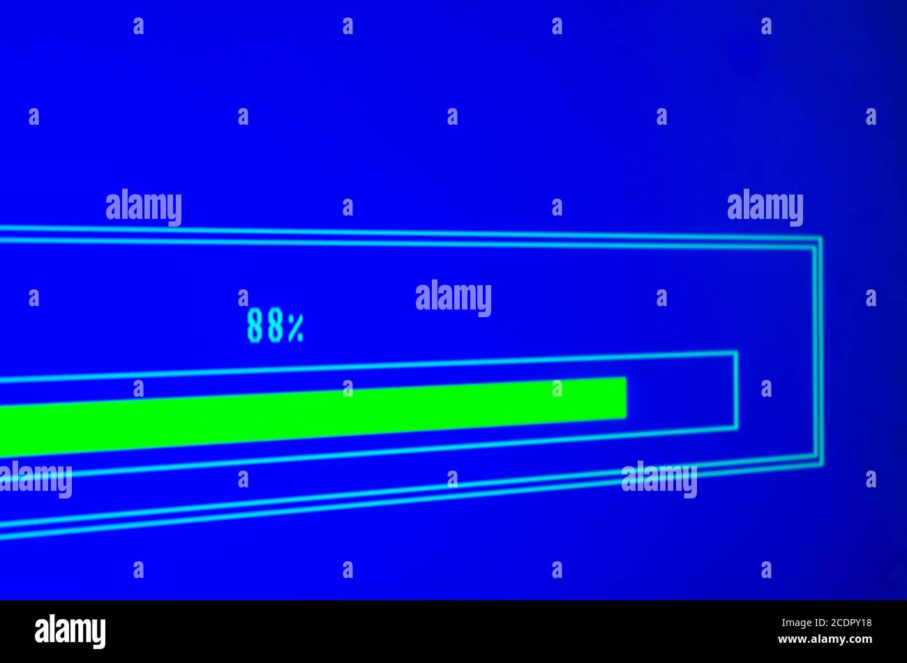 laptop with 88% loading bar on a blue screen. Setting the loading ...