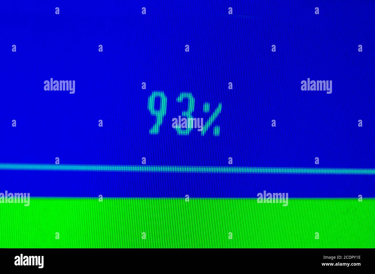 laptop with 93% loading bar on a blue screen. Setting the loading ...