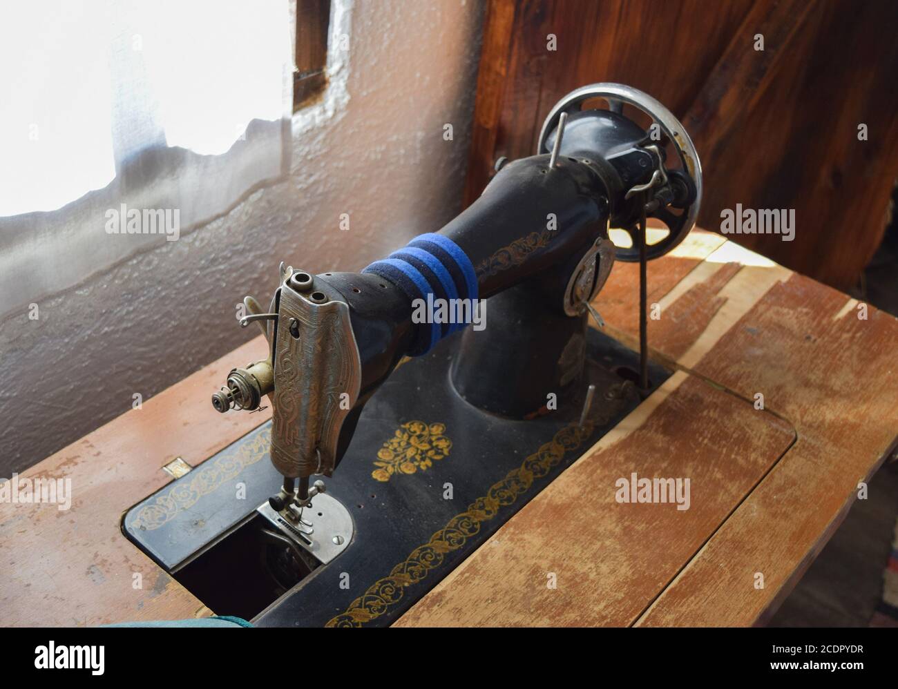 The old manual sewing machine. The machine for stitching thread wear ...