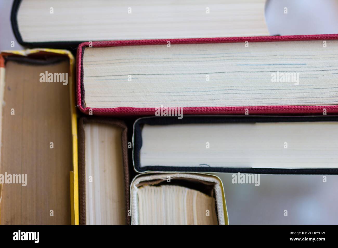 Closeup stacked old books hi-res stock photography and images - Alamy