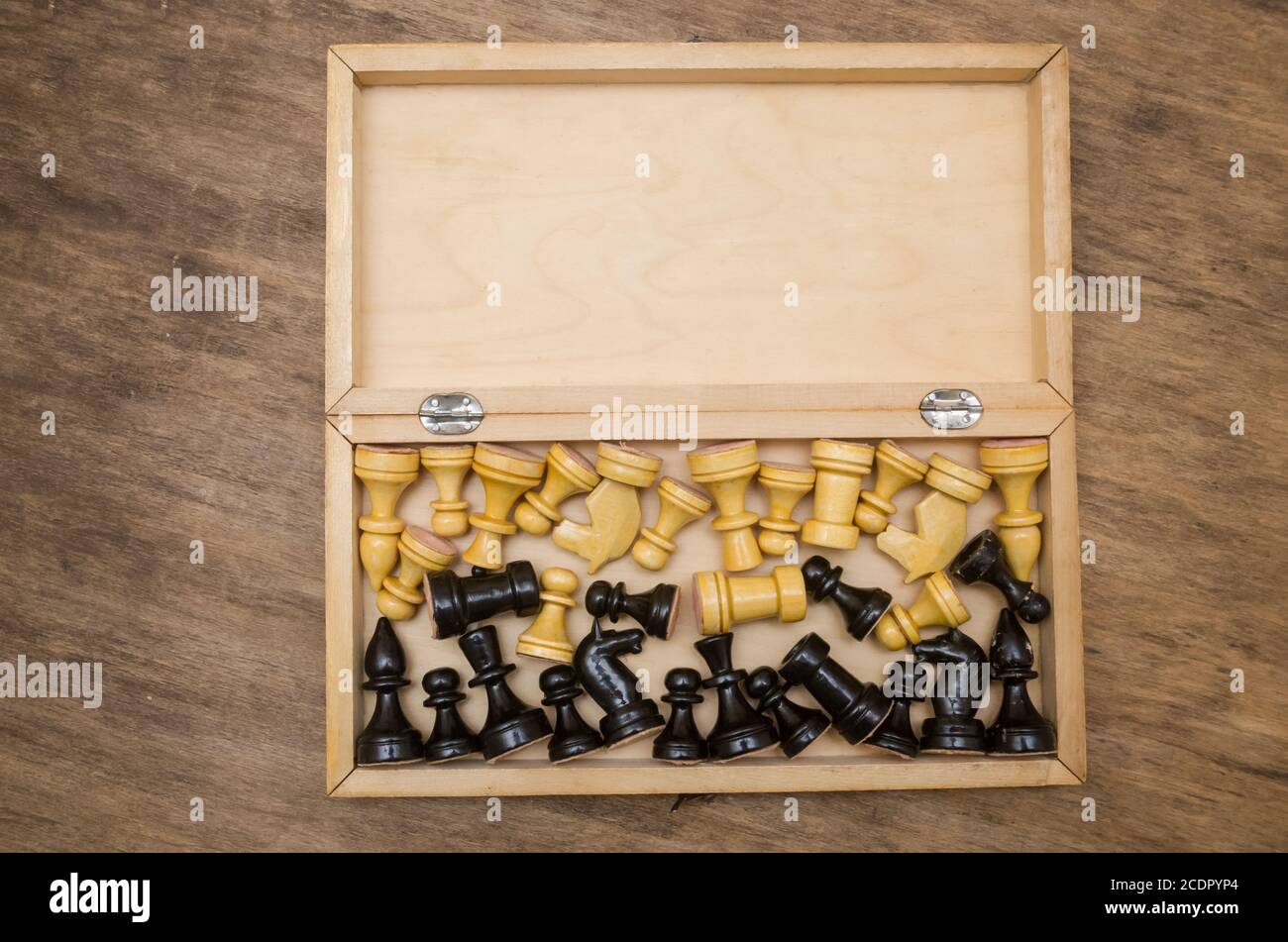 Open chess box with some black and white chess figures inside Stock ...
