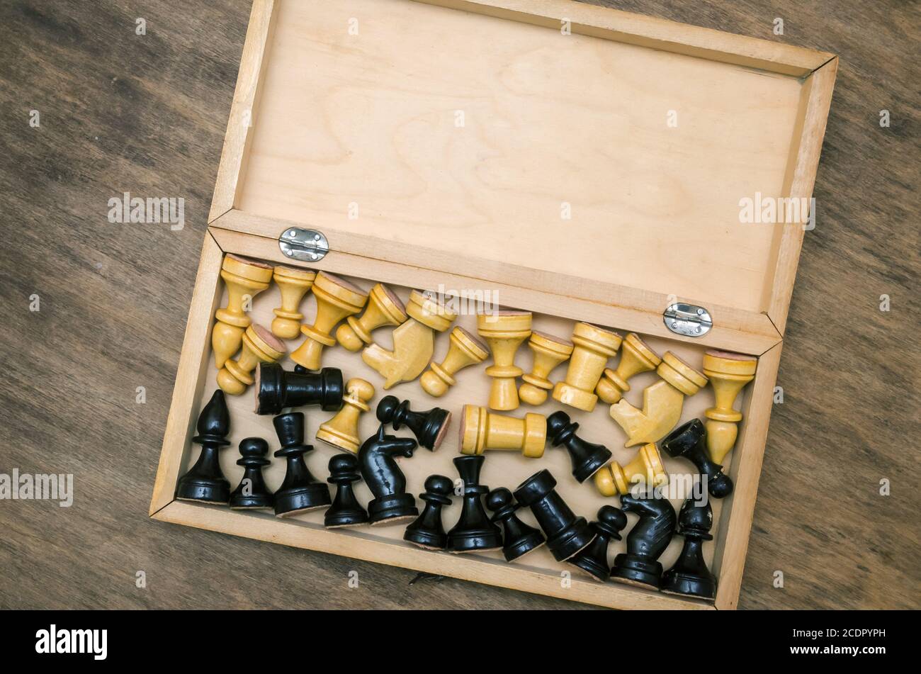 Open chess box with some black and white chess figures inside Stock ...