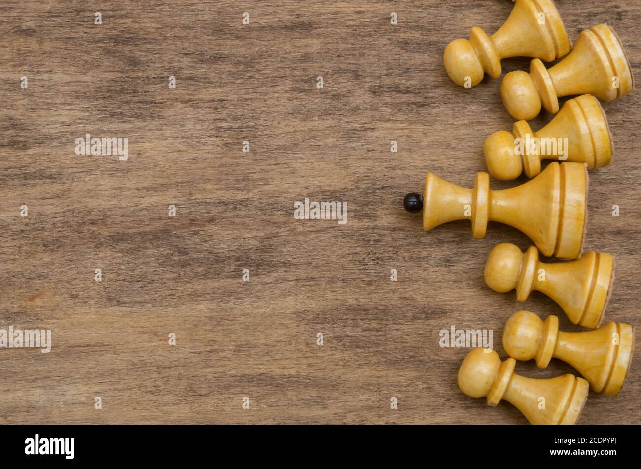 white chess figures on the brown wooden table background Stock Photo ...