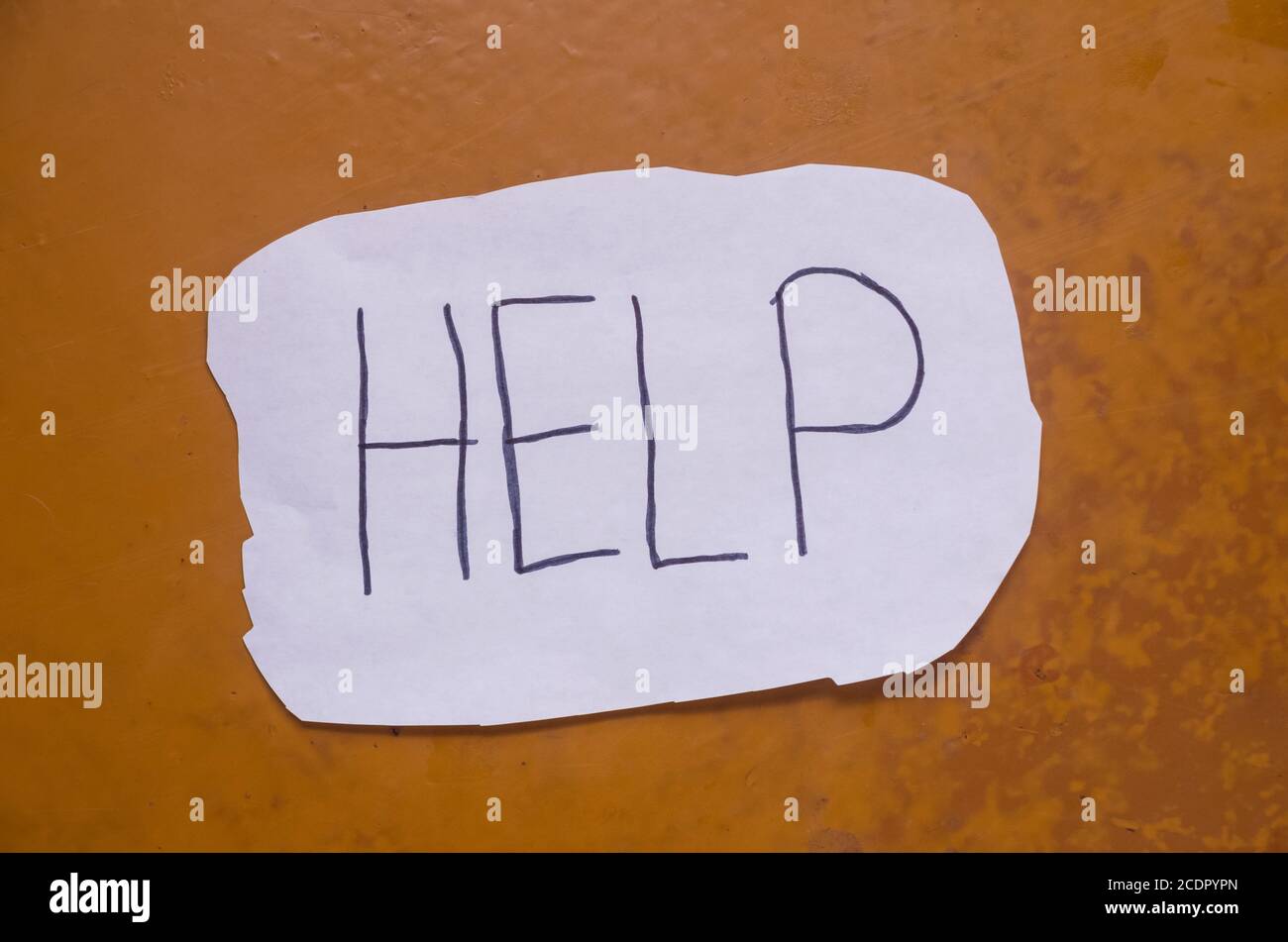 a sheet of paper on the floor labeled HELP Stock Photo - Alamy