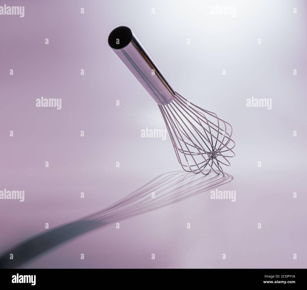 Whisk isolated against a white background Stock Photo - Alamy