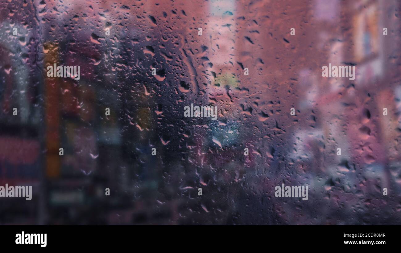 Raindrops on the window. Night city. Rainy weather Stock Photo - Alamy