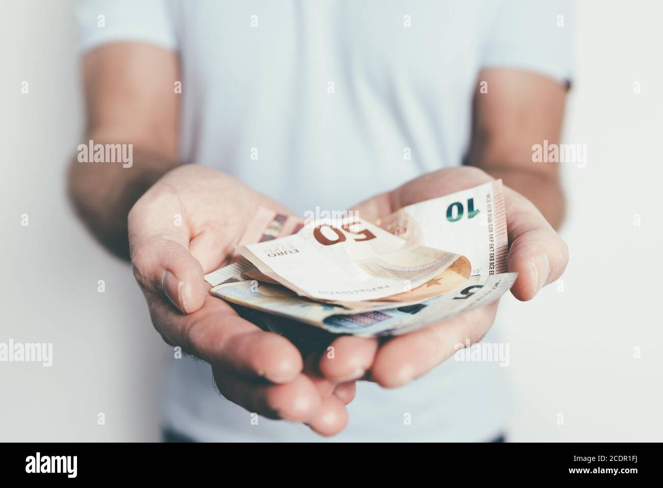 Offering of money hi-res stock photography and images - Alamy