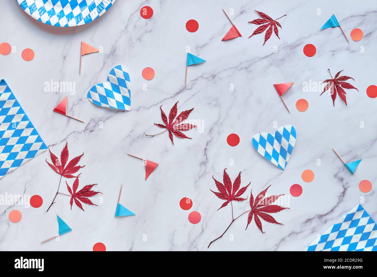 Oktoberfest party background with seasonal decorations, red and orange ...