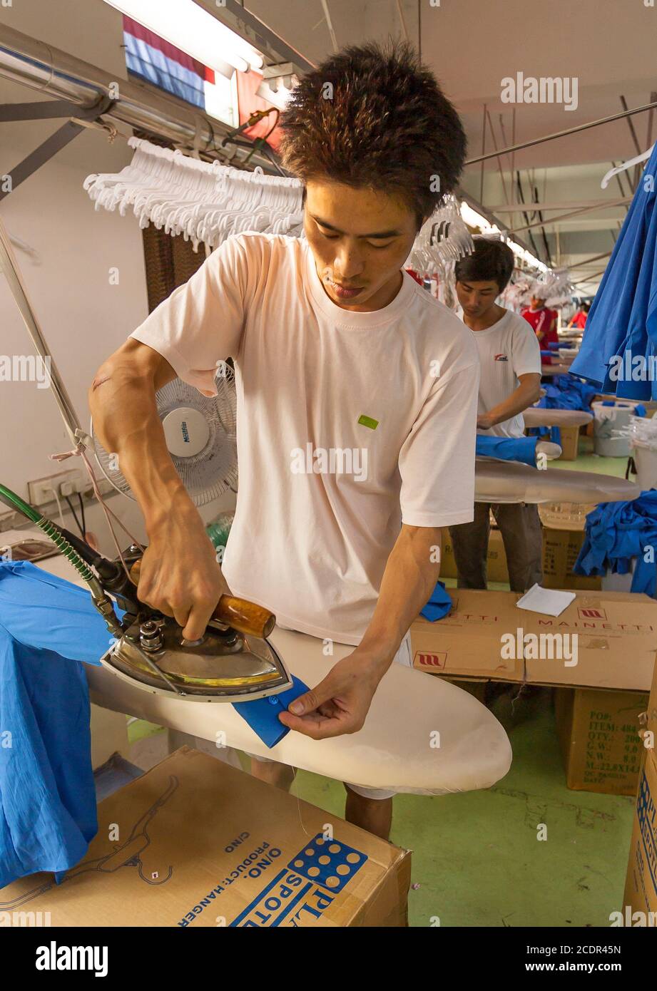Ironing garment in clothing factory hi-res stock photography and images ...