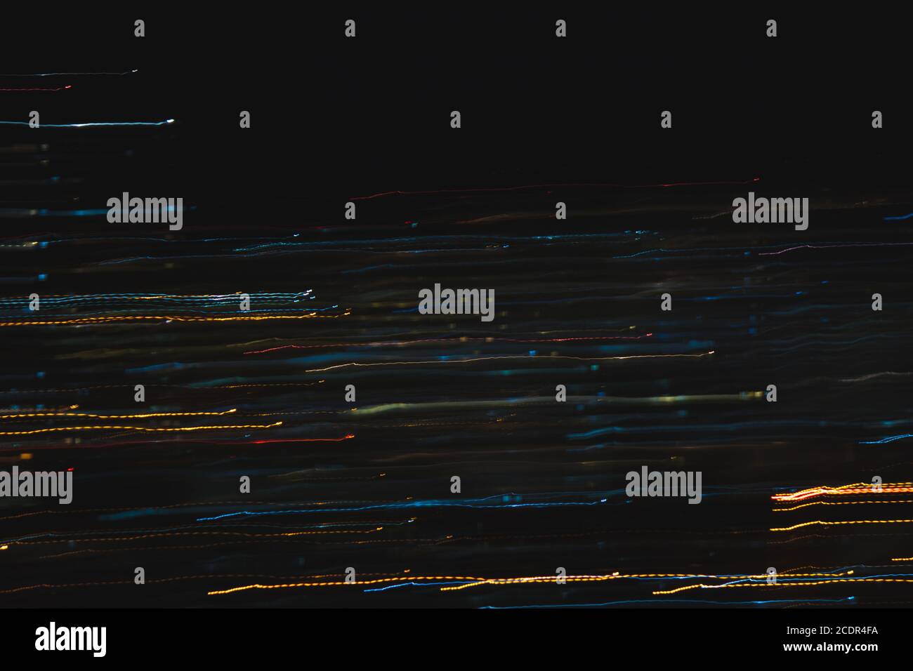 Futuristic overlay light pattern. Lights trails in the black background ...