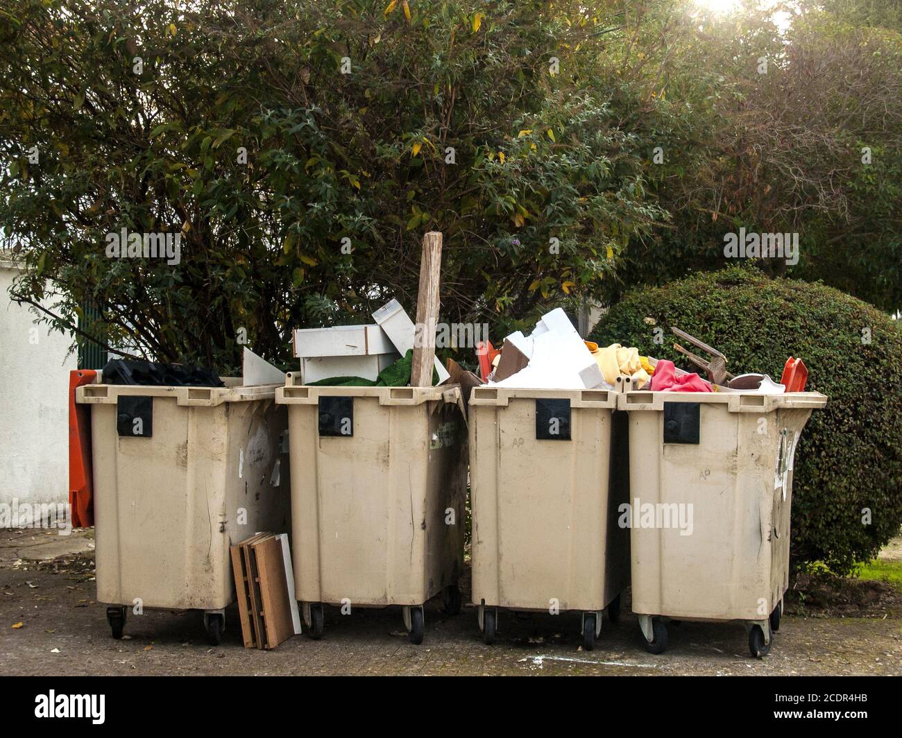 Garbage containers on a village Stock Photo - Alamy