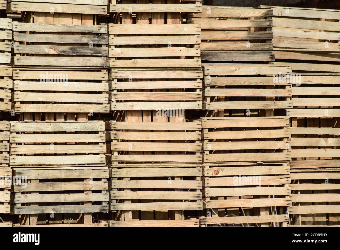 Wooden boxes stacked together. Warehouse empty wooden containers Stock ...