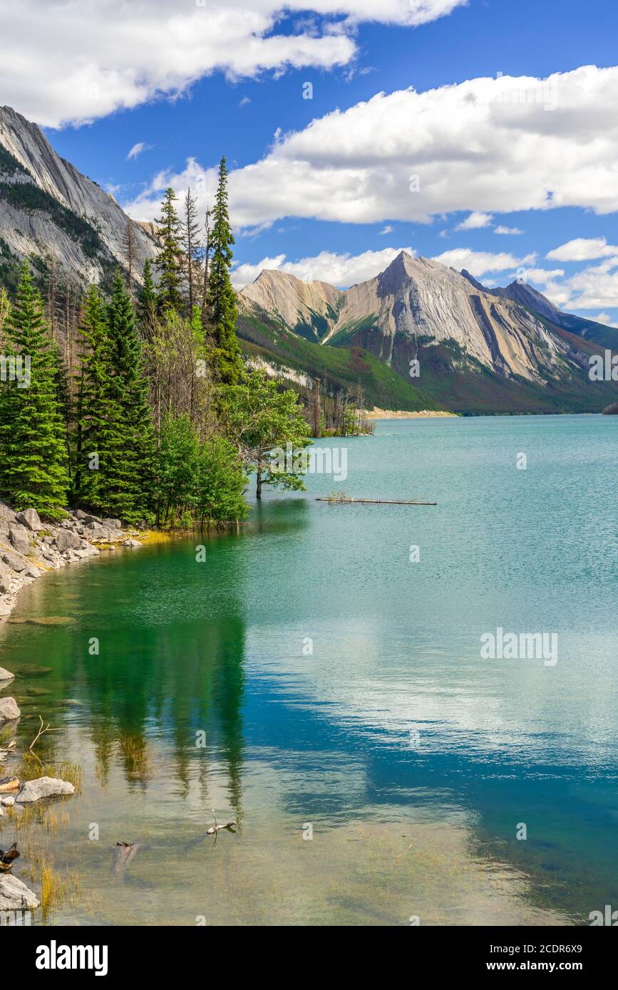 Medicine Lake With Reflections In Jasper MNational Park Alberta medicine-lake-with-reflections-in-jasper-mnational-park-alberta