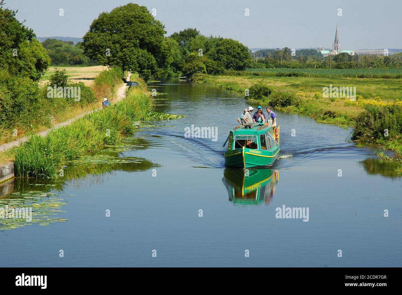Canal pleasure boat 'Egremont' approaching Hunston bridge. Cathedral of ...
