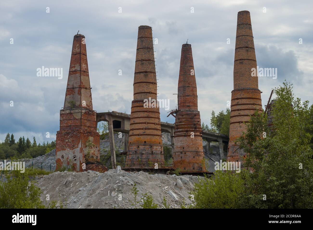 Lime kilns of an abandoned marble and lime factory on a cloudy August ...