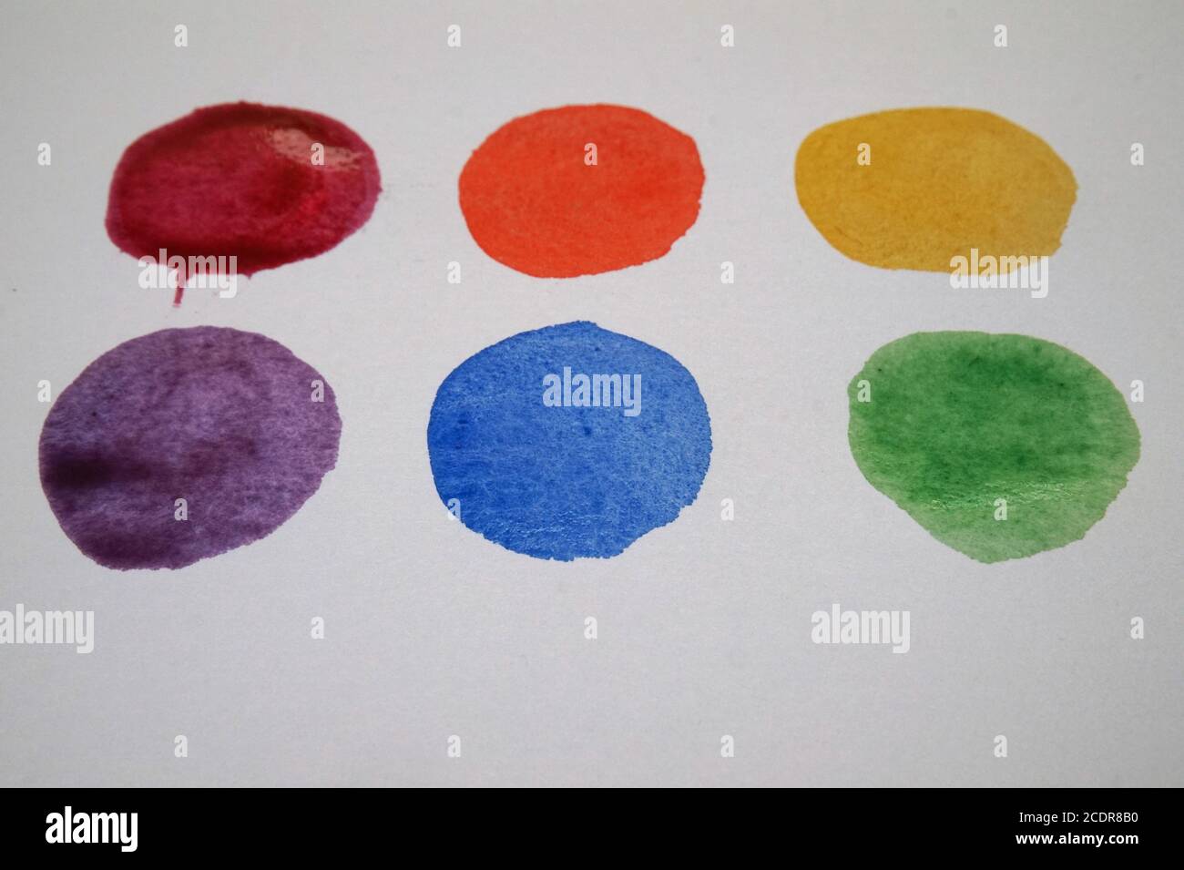 Rainbow coloured paint spots Stock Photo - Alamy