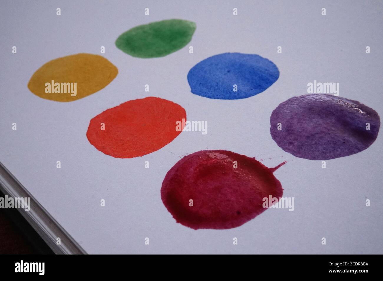 Rainbow coloured paint spots Stock Photo - Alamy