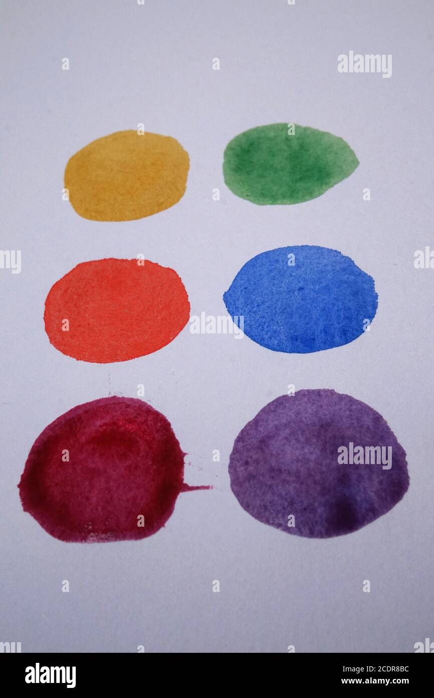 Rainbow coloured paint spots Stock Photo - Alamy