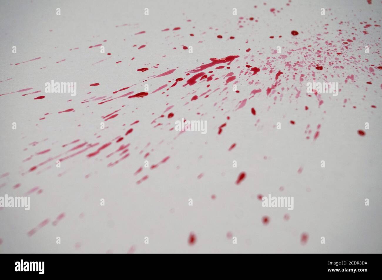 Red paint splatter Stock Photo - Alamy