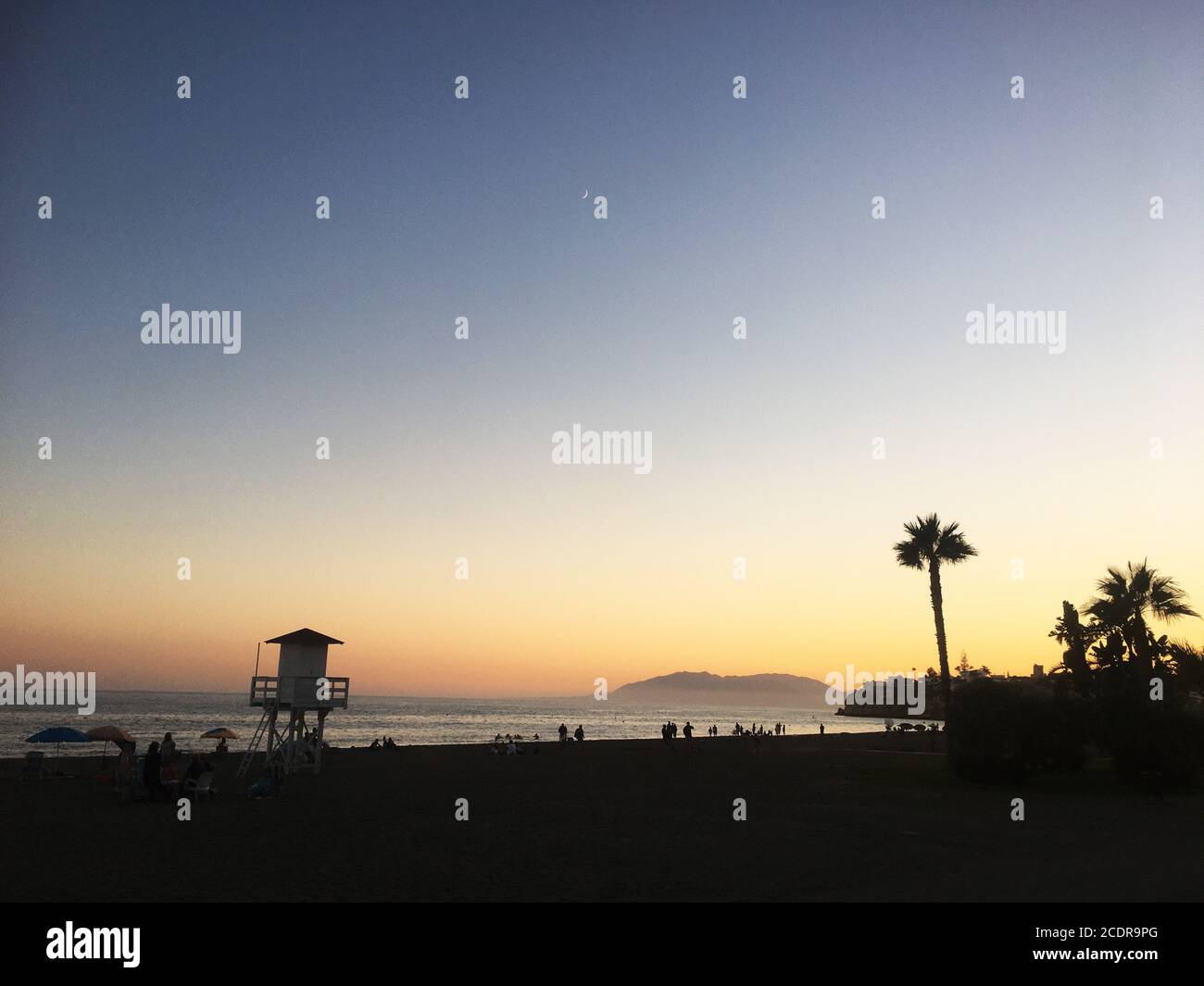 Malaga coast at sunset Stock Photo - Alamy