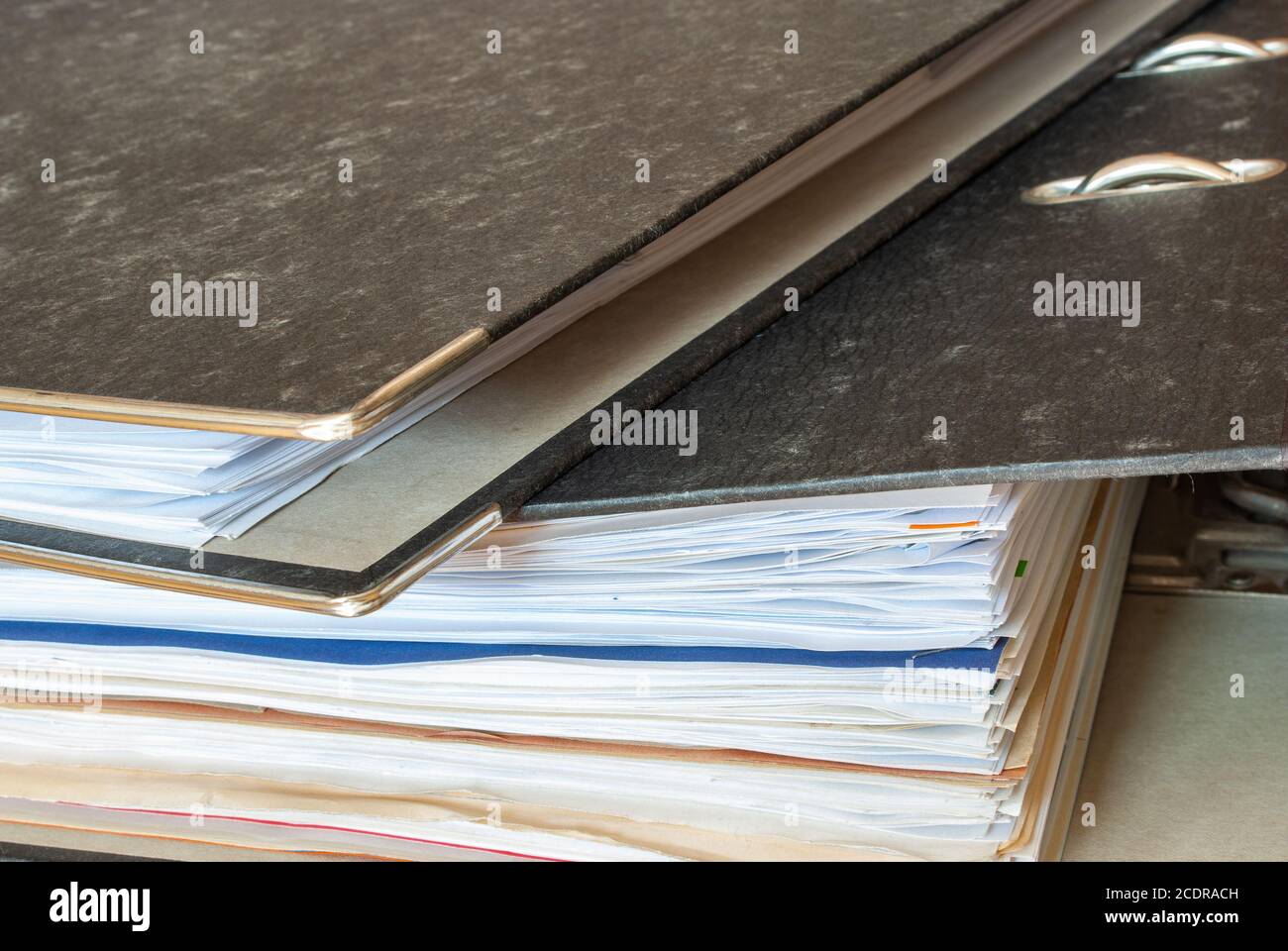 A stack of files in thick folders Stock Photo - Alamy
