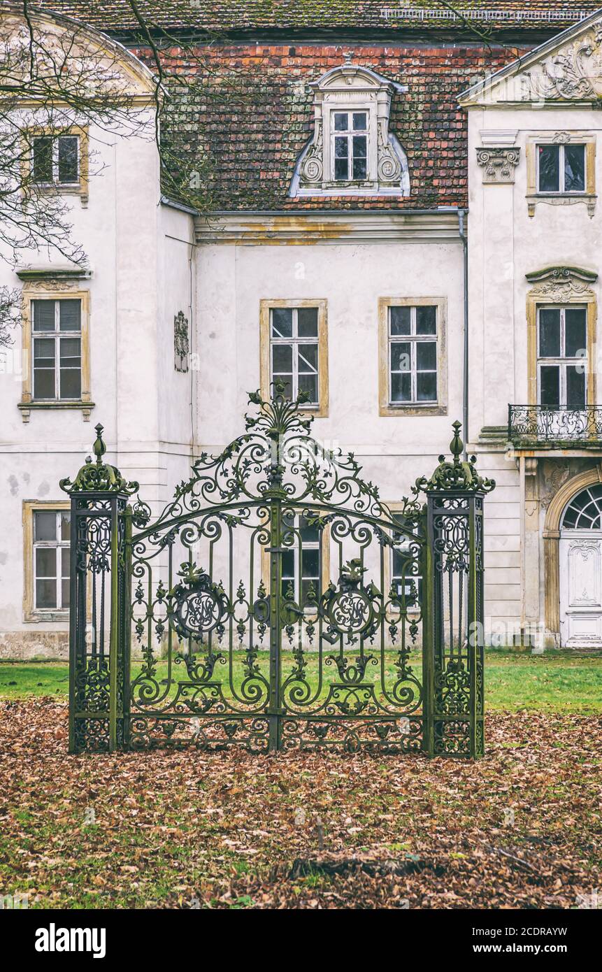Behind closed gates - an old abandoned and dilapidated manor house ...