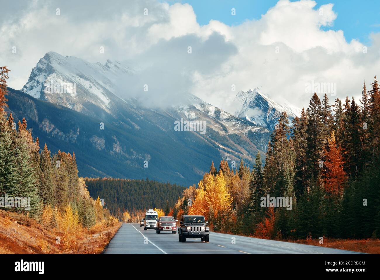 Car on road in Banff National Park in Canada Stock Photo - Alamy