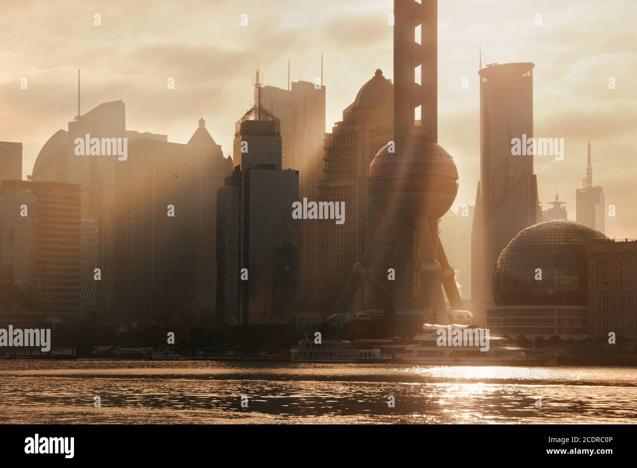 Shanghai morning with sunny sky and water reflections in China Stock ...