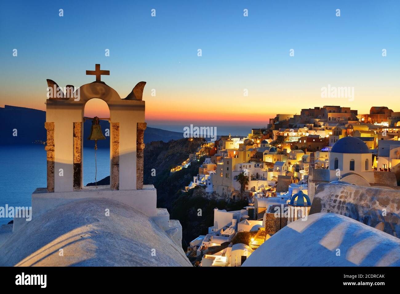 Santorini skyline with buildings and bell tower in Greece Stock Photo ...