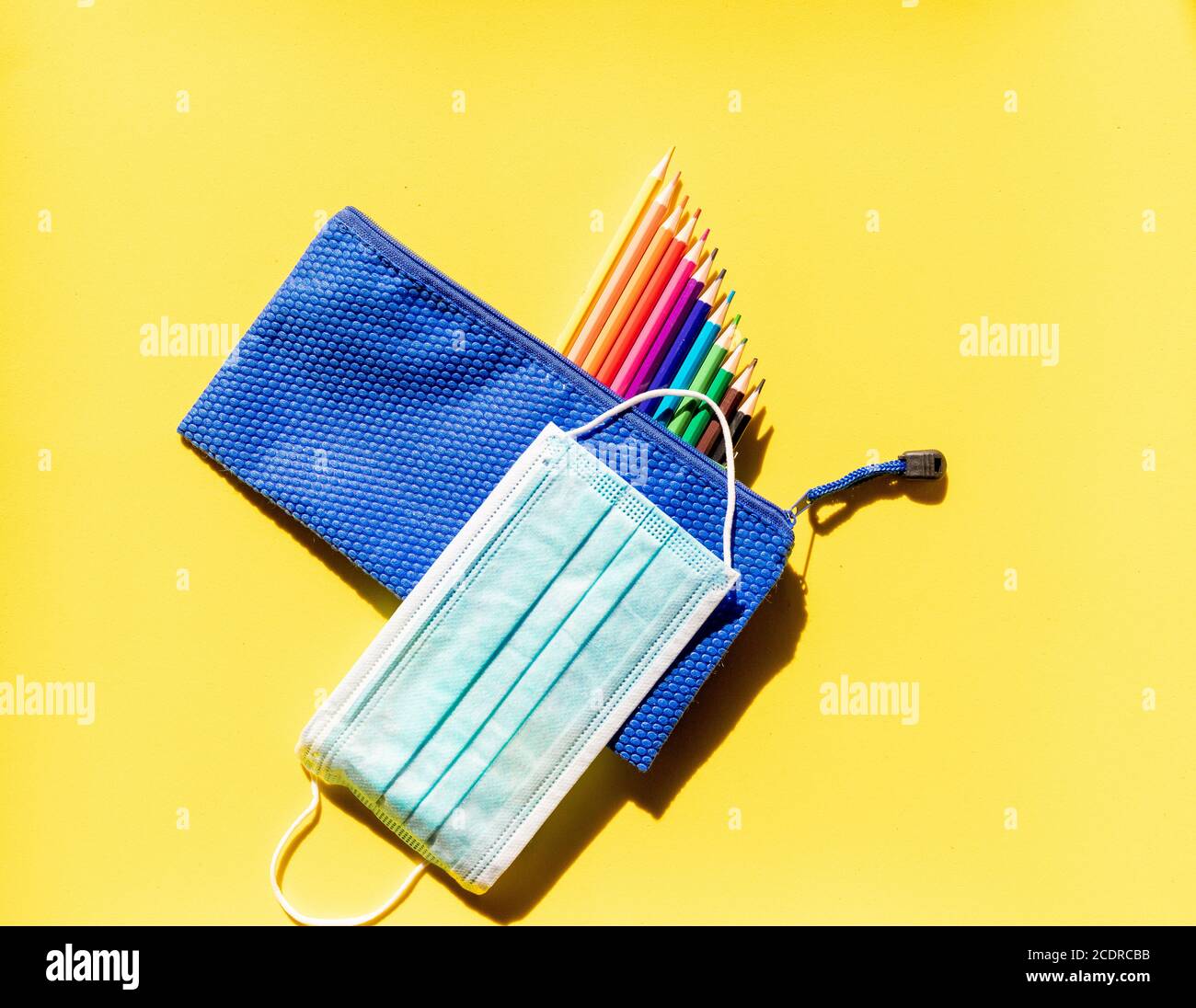 Back to school. Colorful image with children's case, color pencils and ...