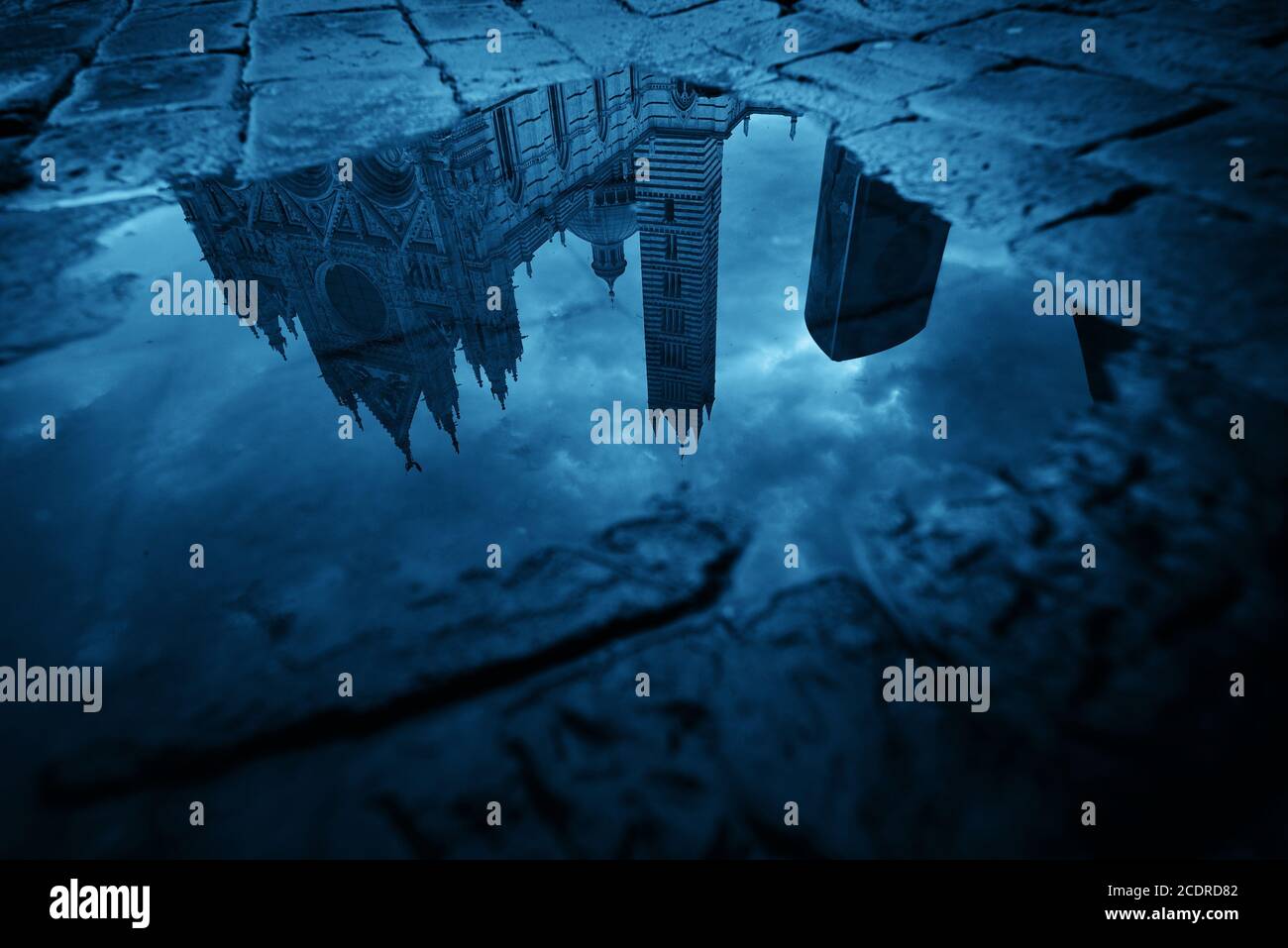 Siena Cathedral reflection after rain as the famous landmark in ...