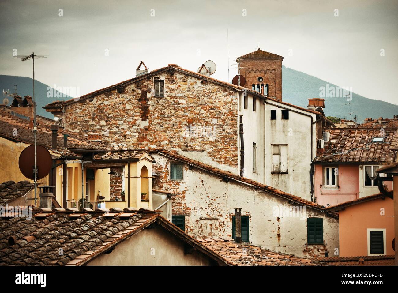 Lucca roof in different style in Italy Stock Photo - Alamy