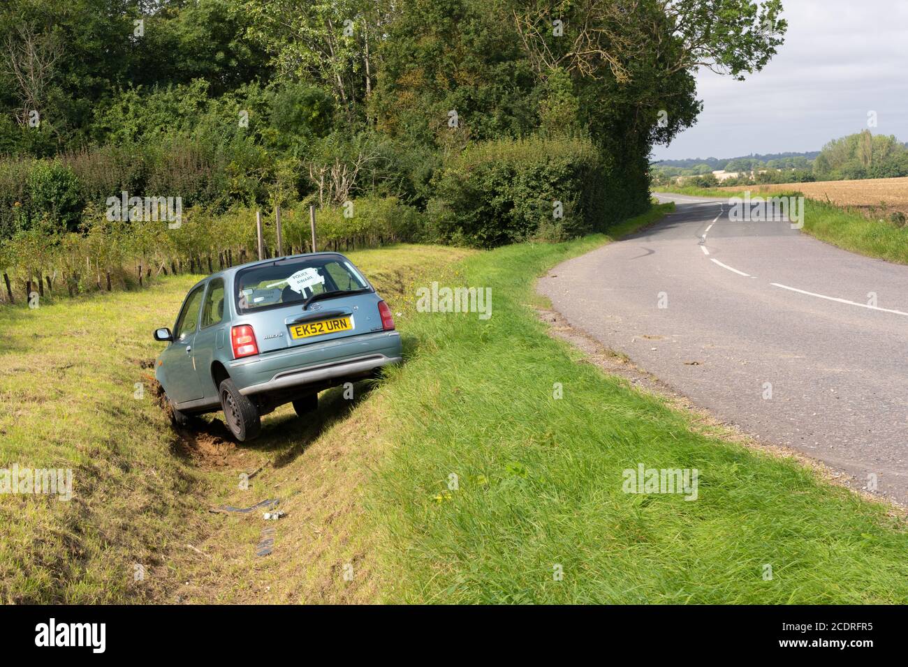 Abandoned car in a ditch after it took a corner too fast Stock Photo ...