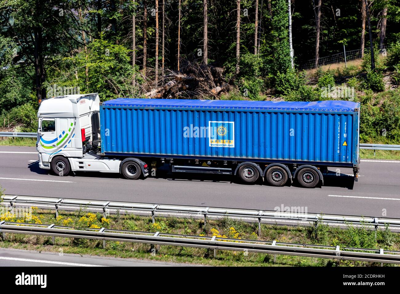 DAF XF truck with Sarjak bulk container on motorway Stock Photo - Alamy