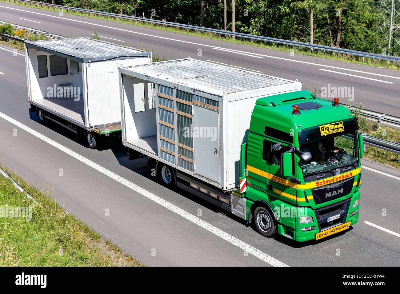 Schmallenbach MAN flatbed combination truck with modular building ...