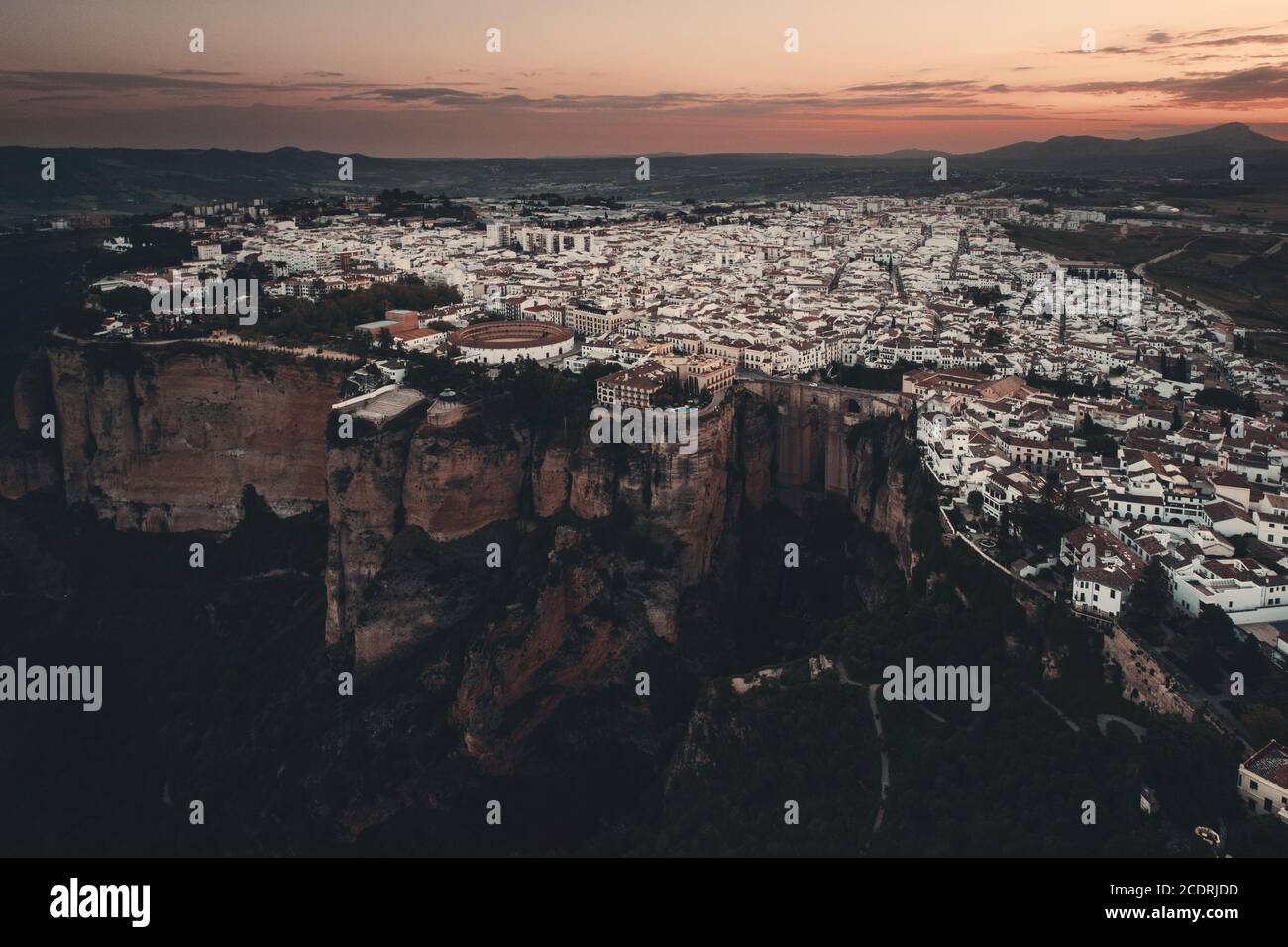 Ronda aerial view at sunrise with old buildings in Spain Stock Photo ...