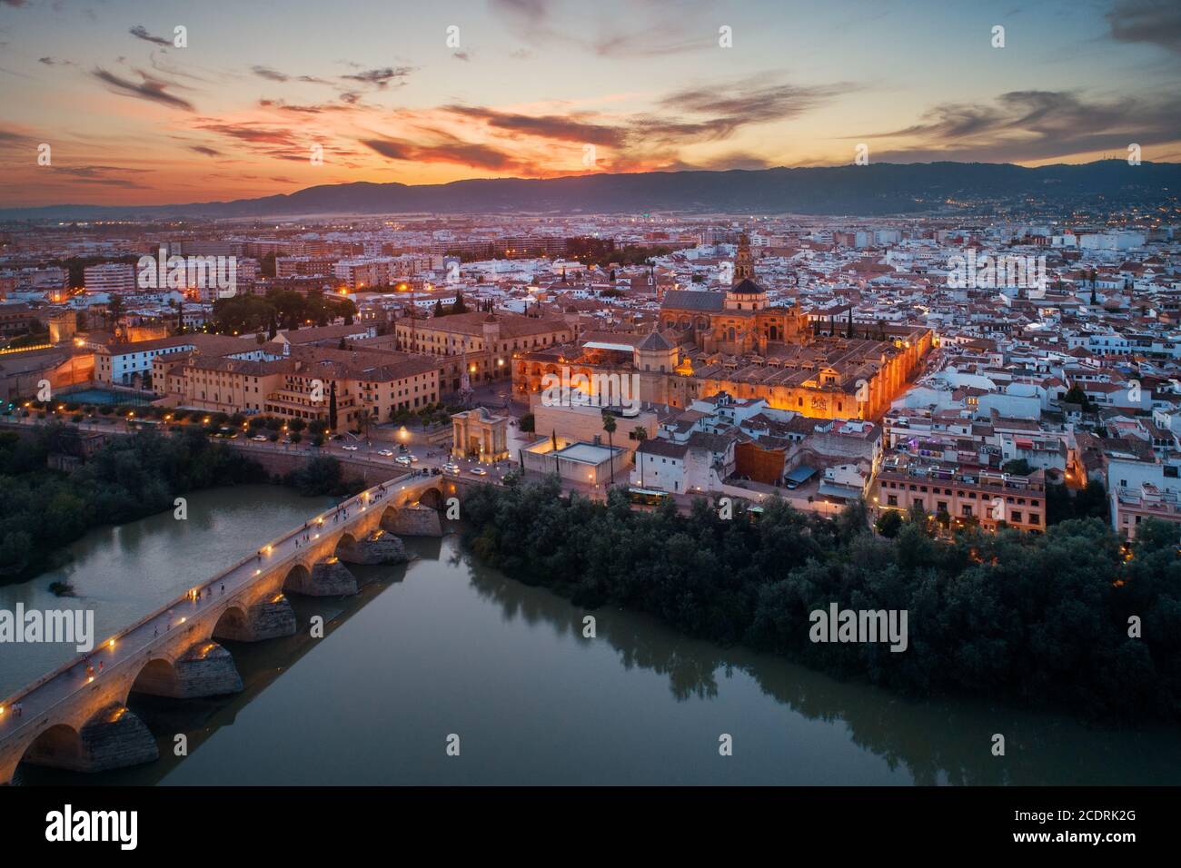 City ancient architecture of Cordoba viewed from air at night in Spain ...