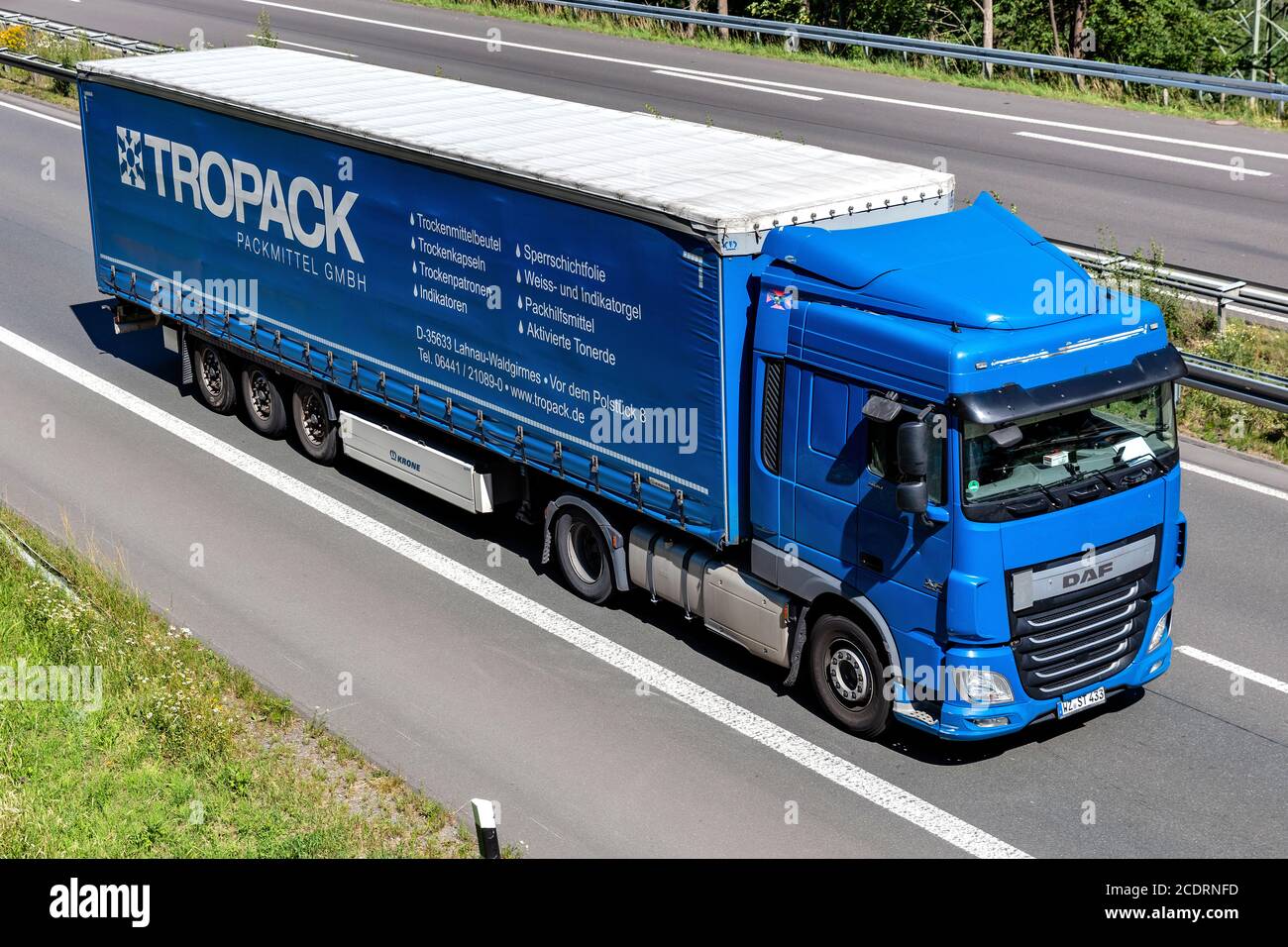 Tropack DAF XF truck with curtainside trailer on motorway Stock Photo ...